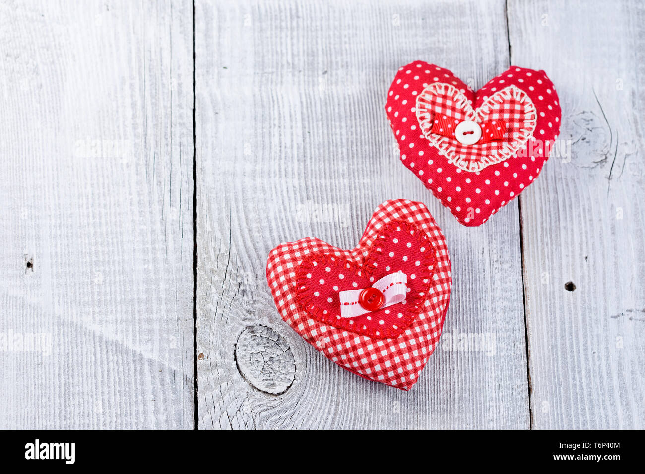Two hearts on wood hi-res stock photography and images - Alamy