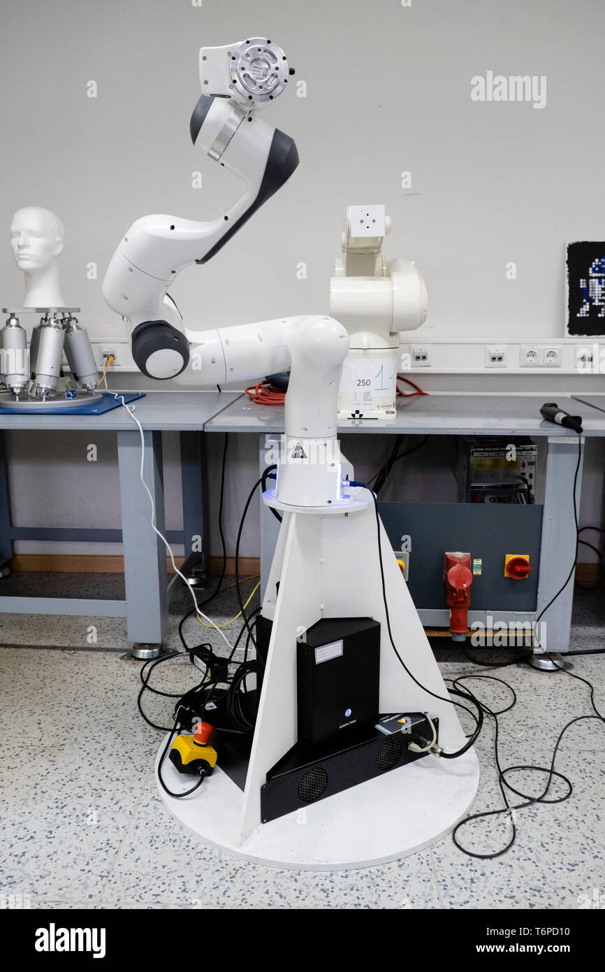 02 May 2019, Schleswig-Holstein, Lübeck: A robot articulated arm is ...