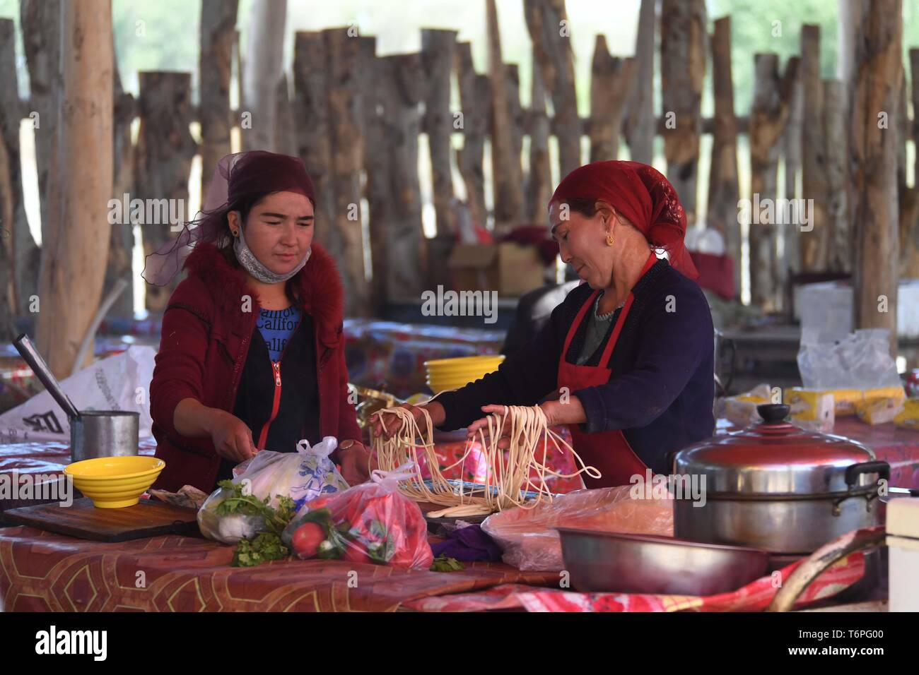 Awat, China's Xinjiang Uygur Autonomous Region. 2nd May, 2019. Locals ...
