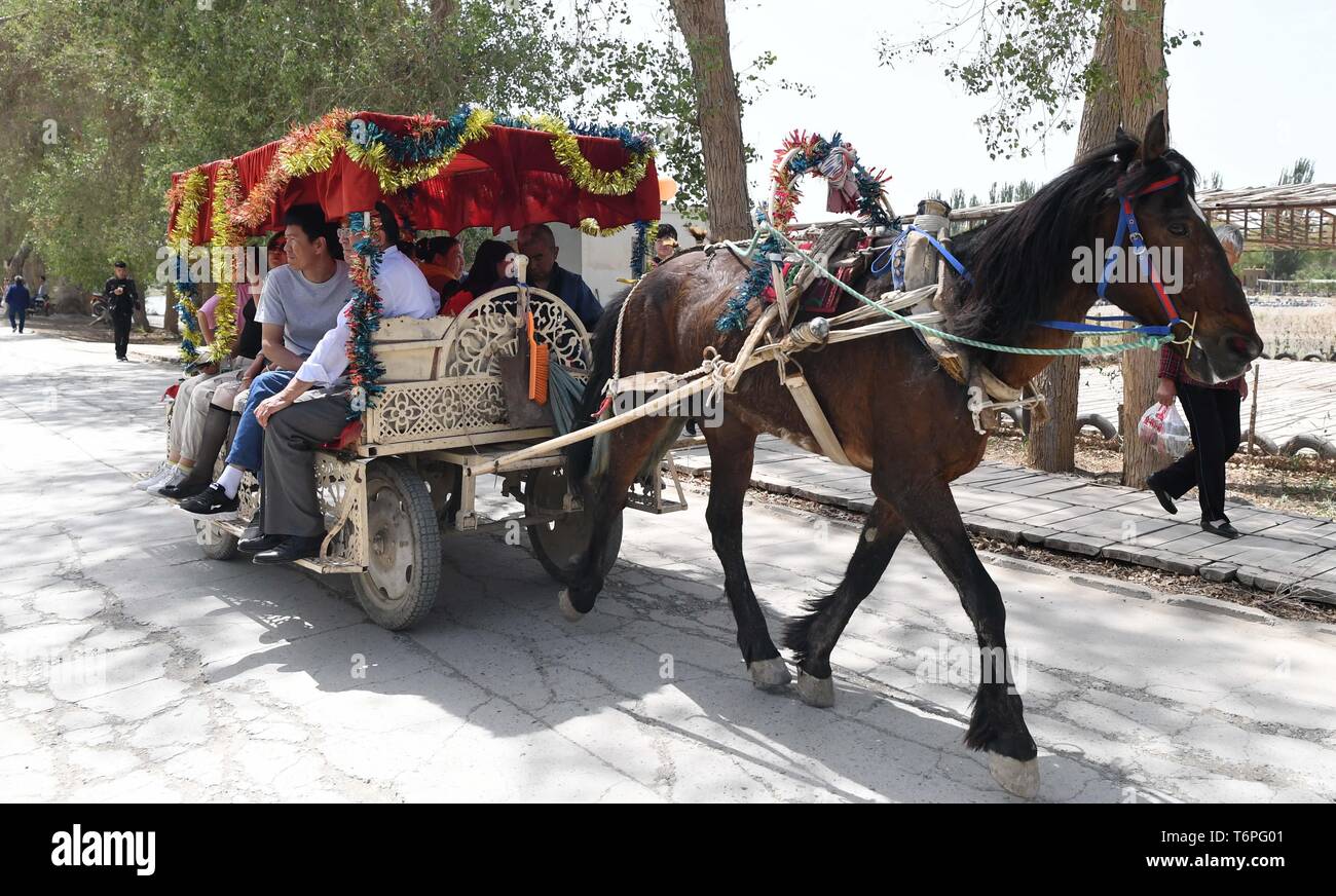 Awat, China's Xinjiang Uygur Autonomous Region. 2nd May, 2019. Tourists ...