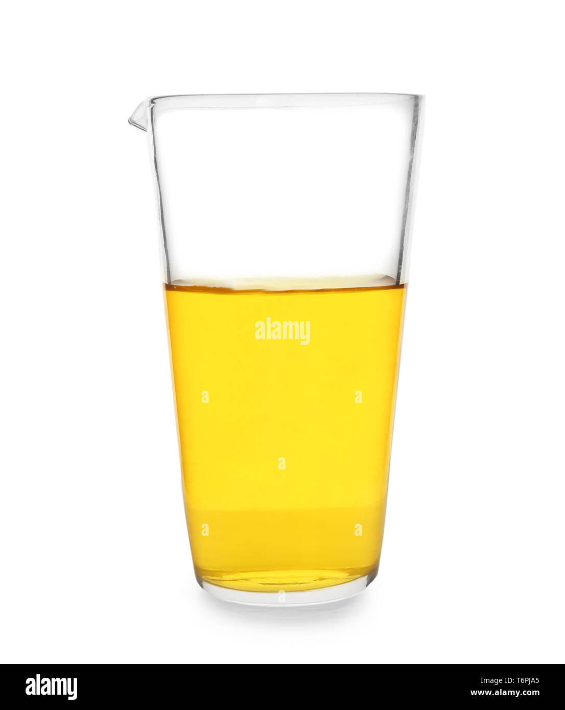 Beaker with yellow liquid on white background Stock Photo - Alamy