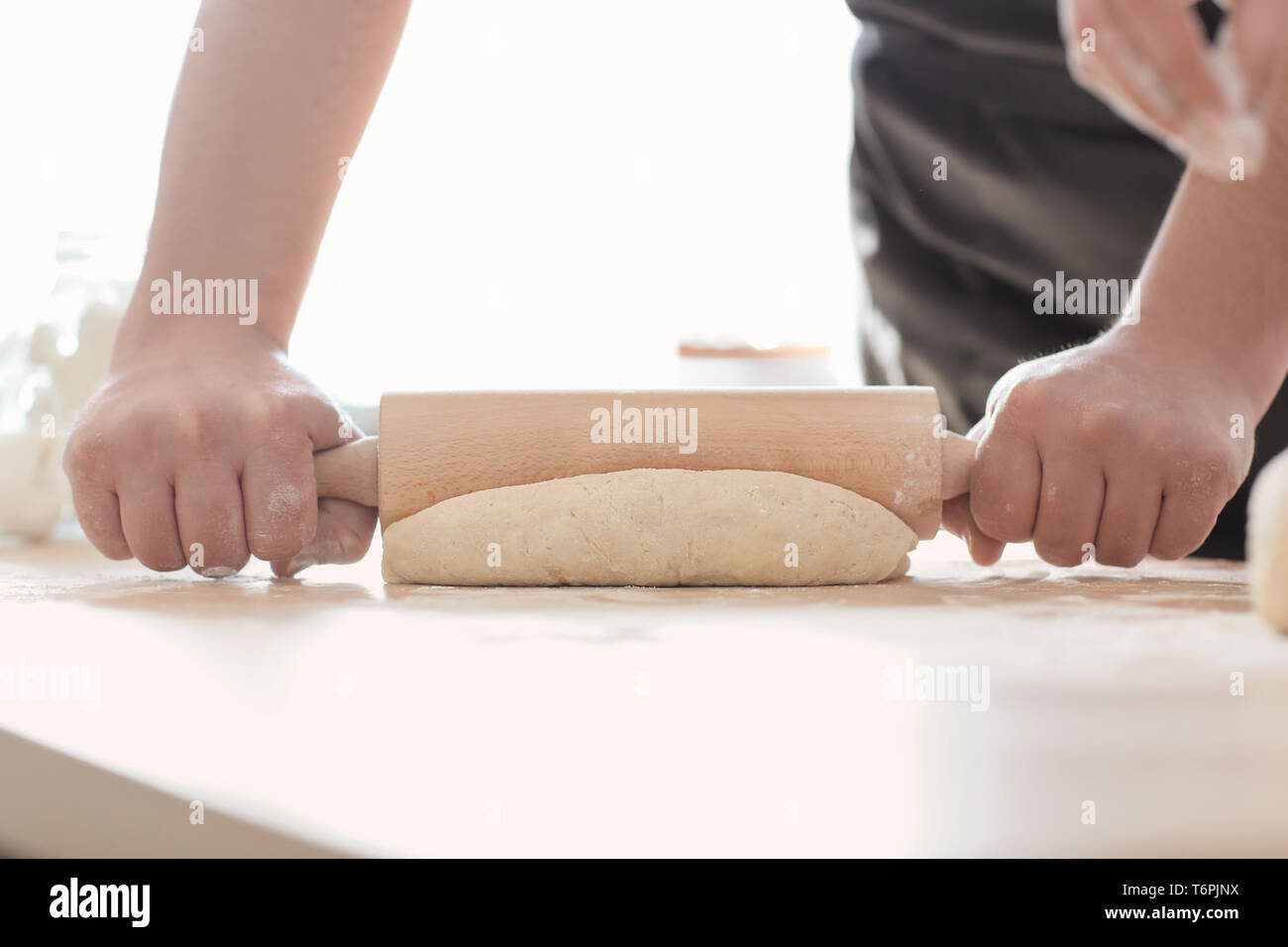 Baker rolling dough hi-res stock photography and images - Alamy