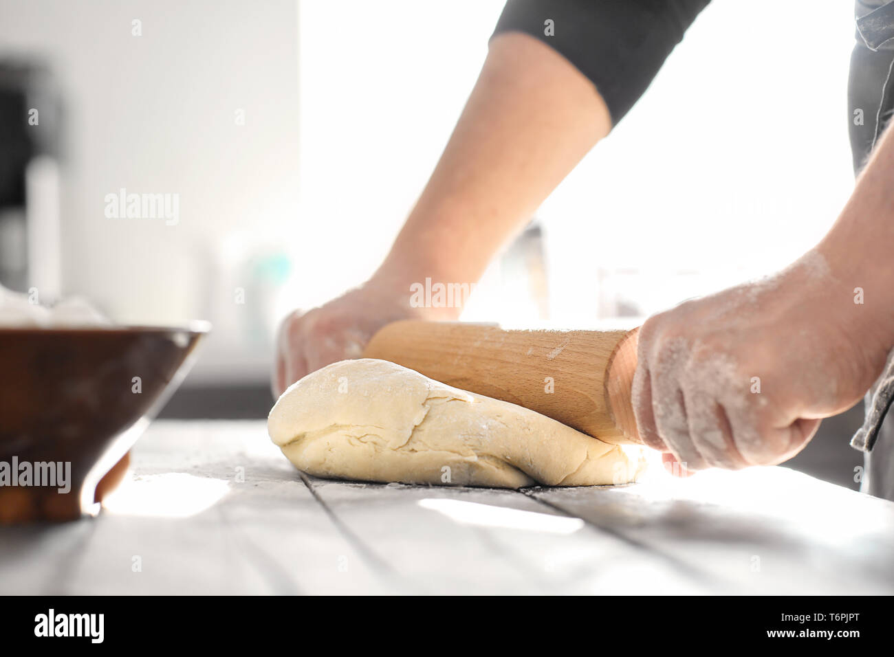 Baker rolling dough hi-res stock photography and images - Alamy
