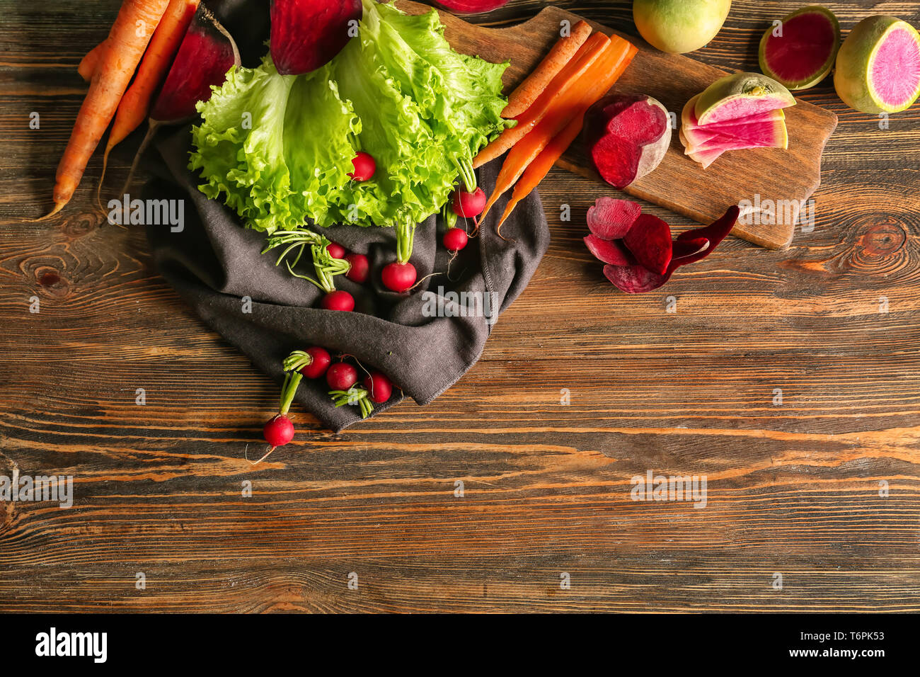 Flat lay composition with ripe fresh vegetables on wooden table Stock ...