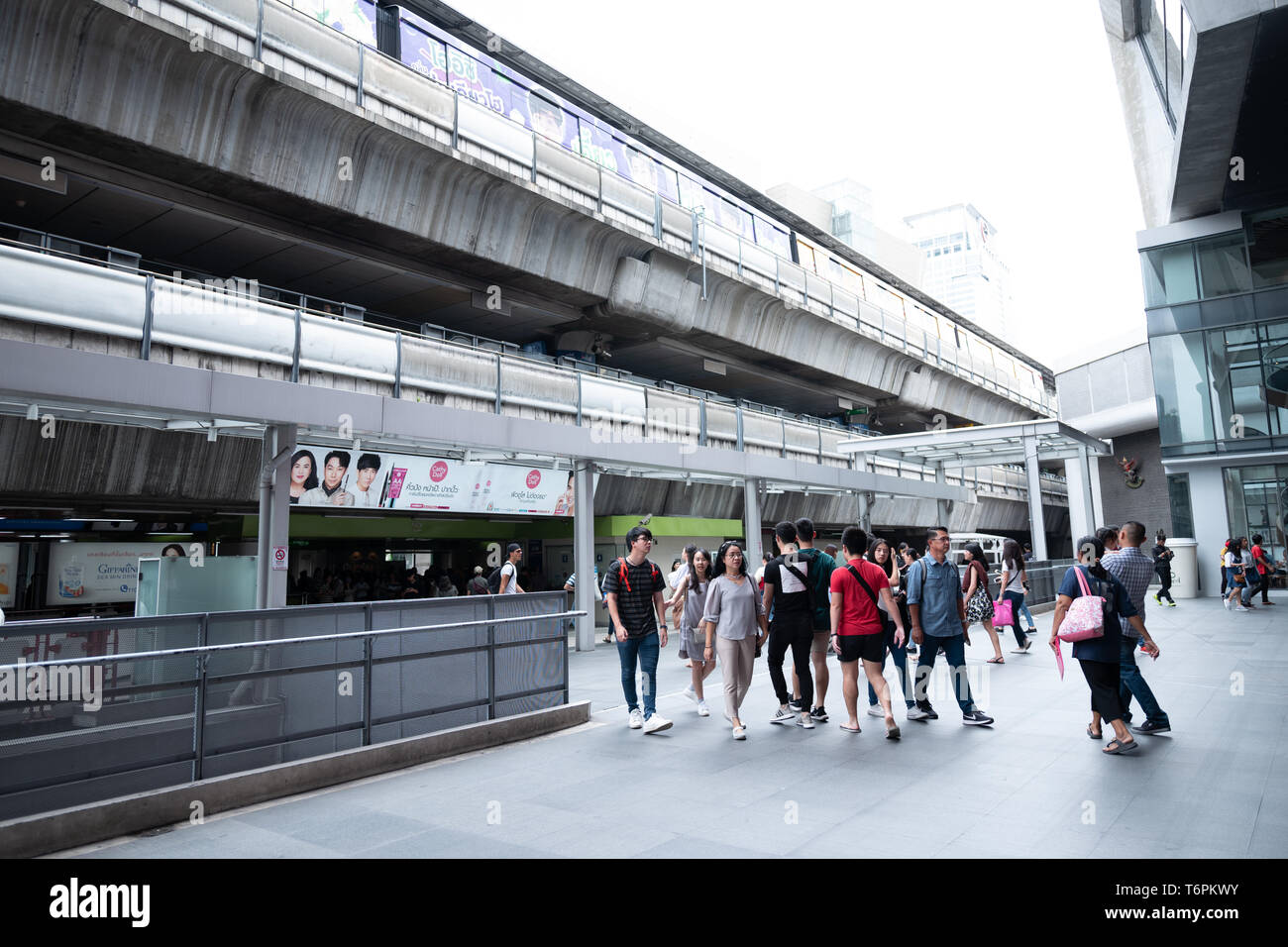 Bangkok, Thailand - 4 Aug, 2018: People walking in the link way between ...