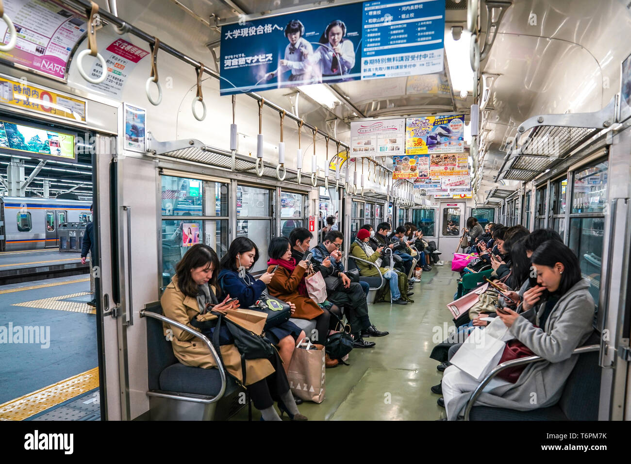 Osaka, Japan - 28 Feb 2018: Passengers are in the train from ...