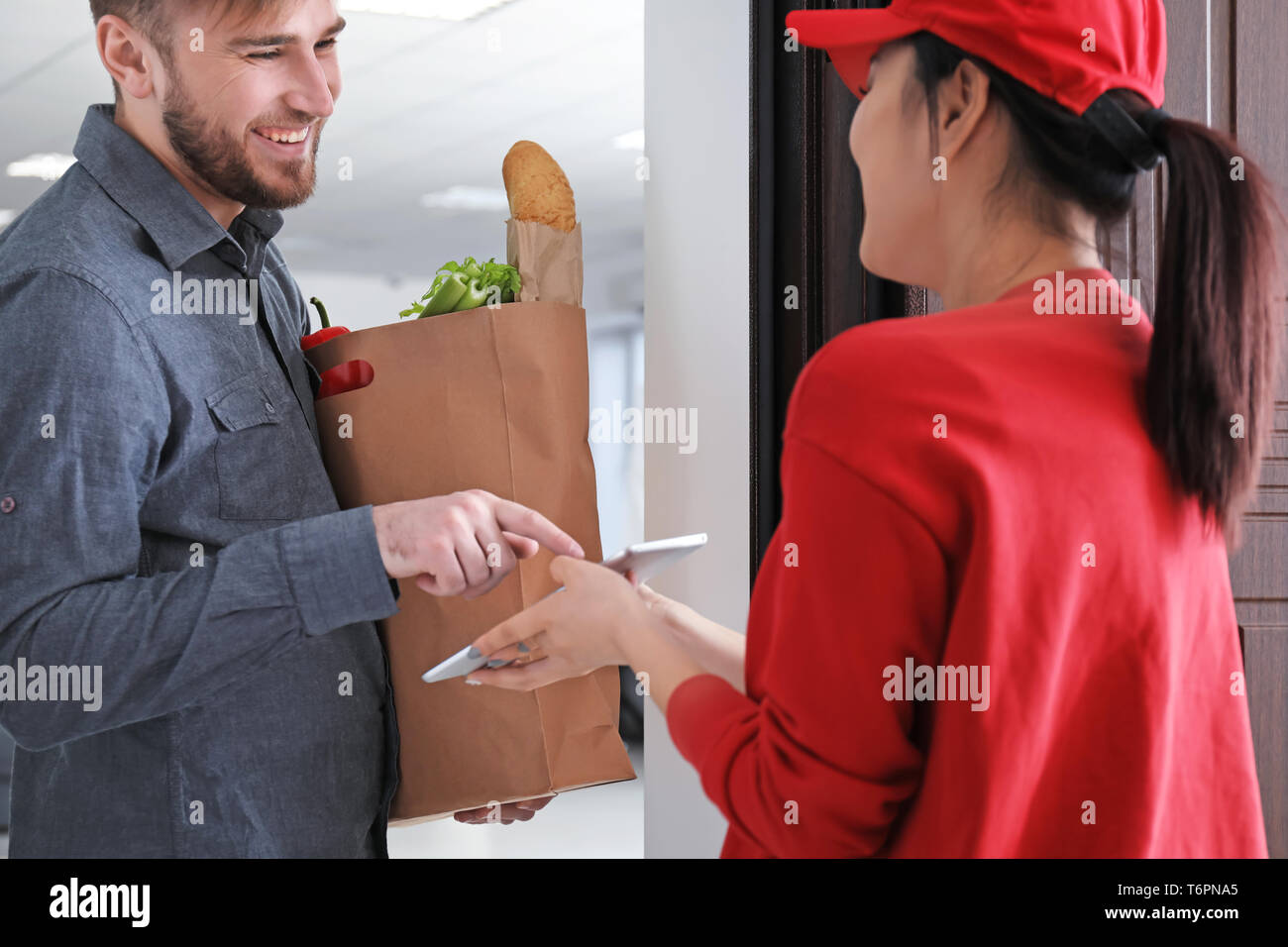 Signing delivery device hi-res stock photography and images - Alamy