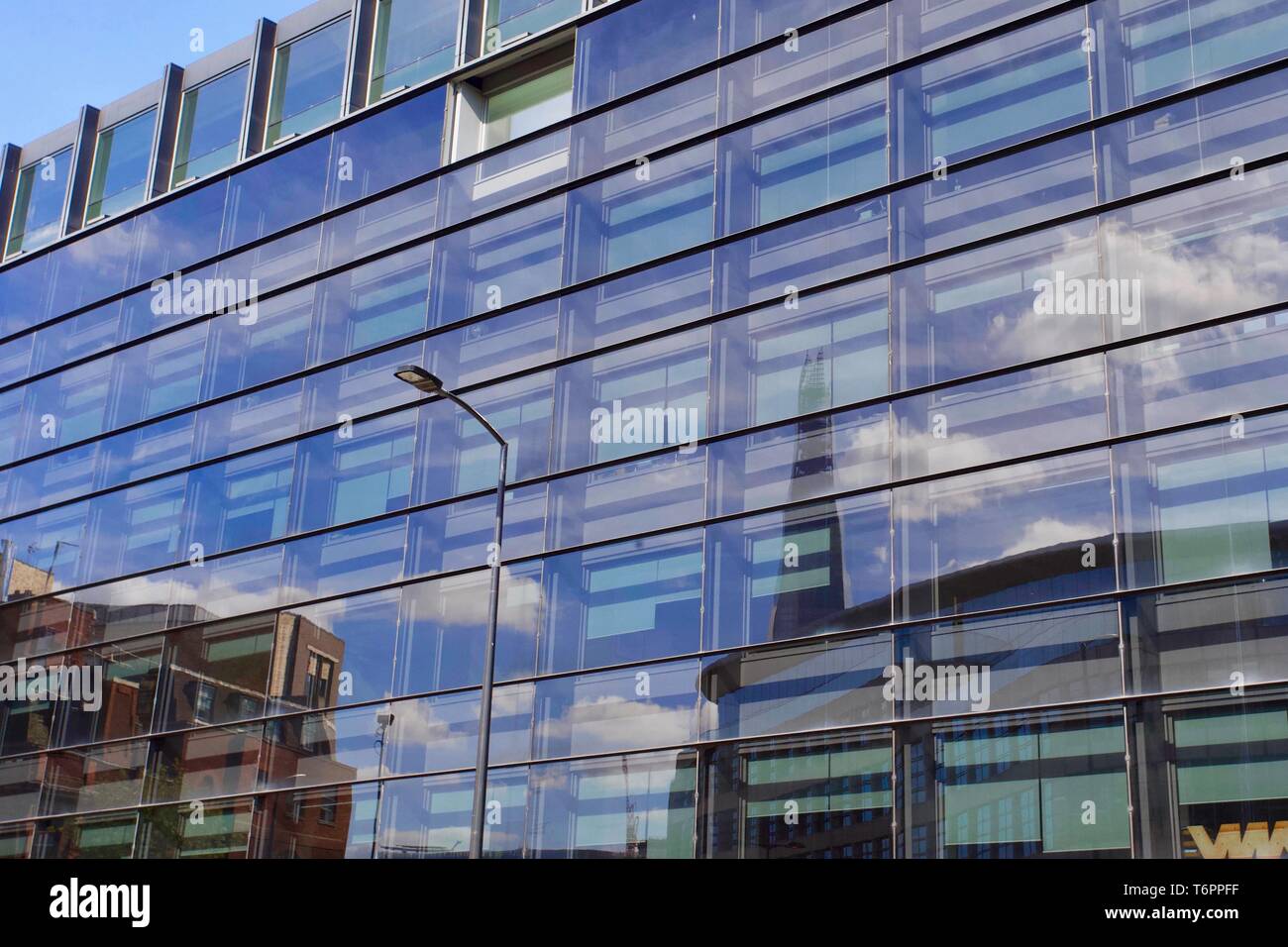 Reflection off glass window, London, England Stock Photo - Alamy