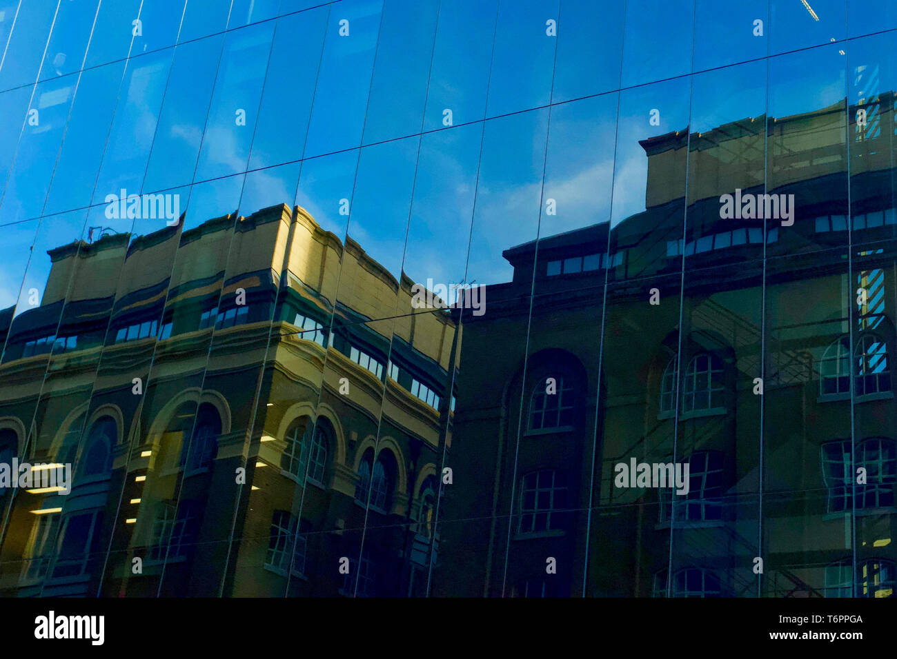 Reflection off glass window, London, England Stock Photo - Alamy