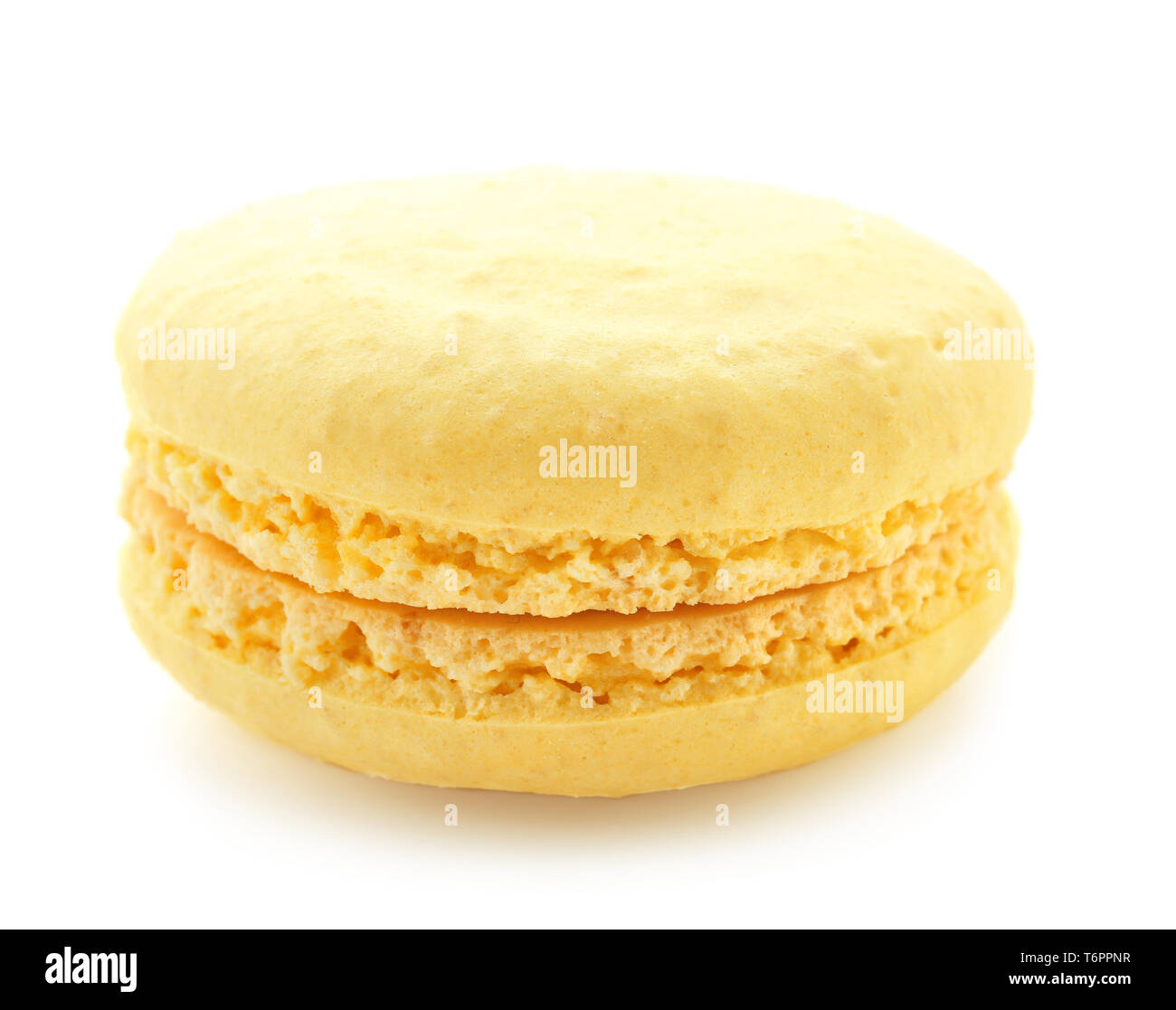 Delicious yellow macaron on white background Stock Photo - Alamy