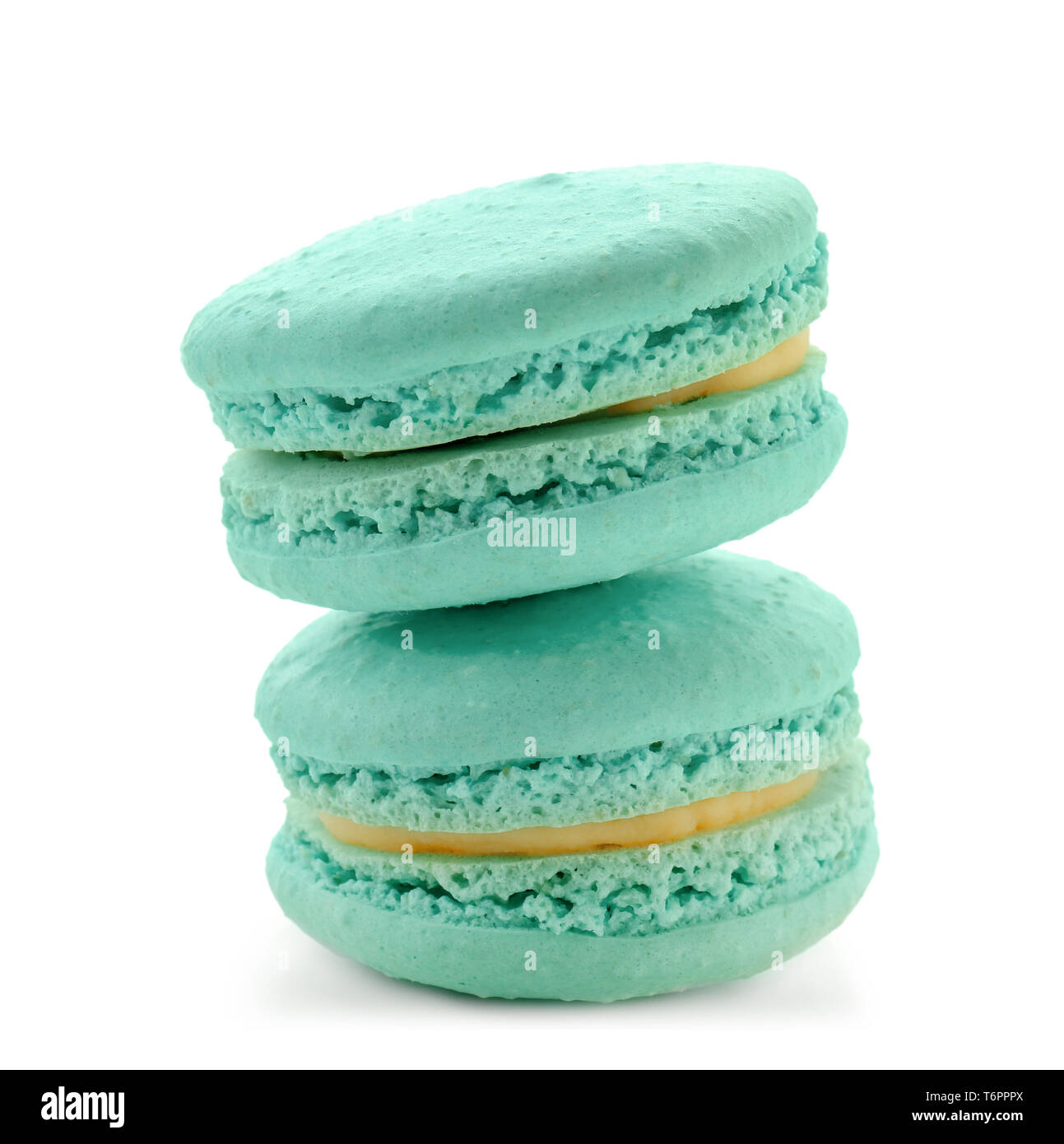 Delicious blue macarons on white background Stock Photo - Alamy