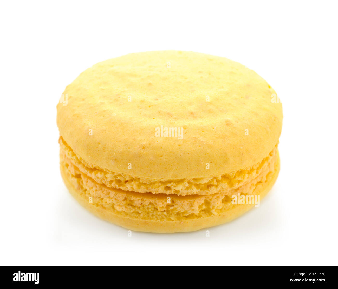 Delicious yellow macaron on white background Stock Photo - Alamy