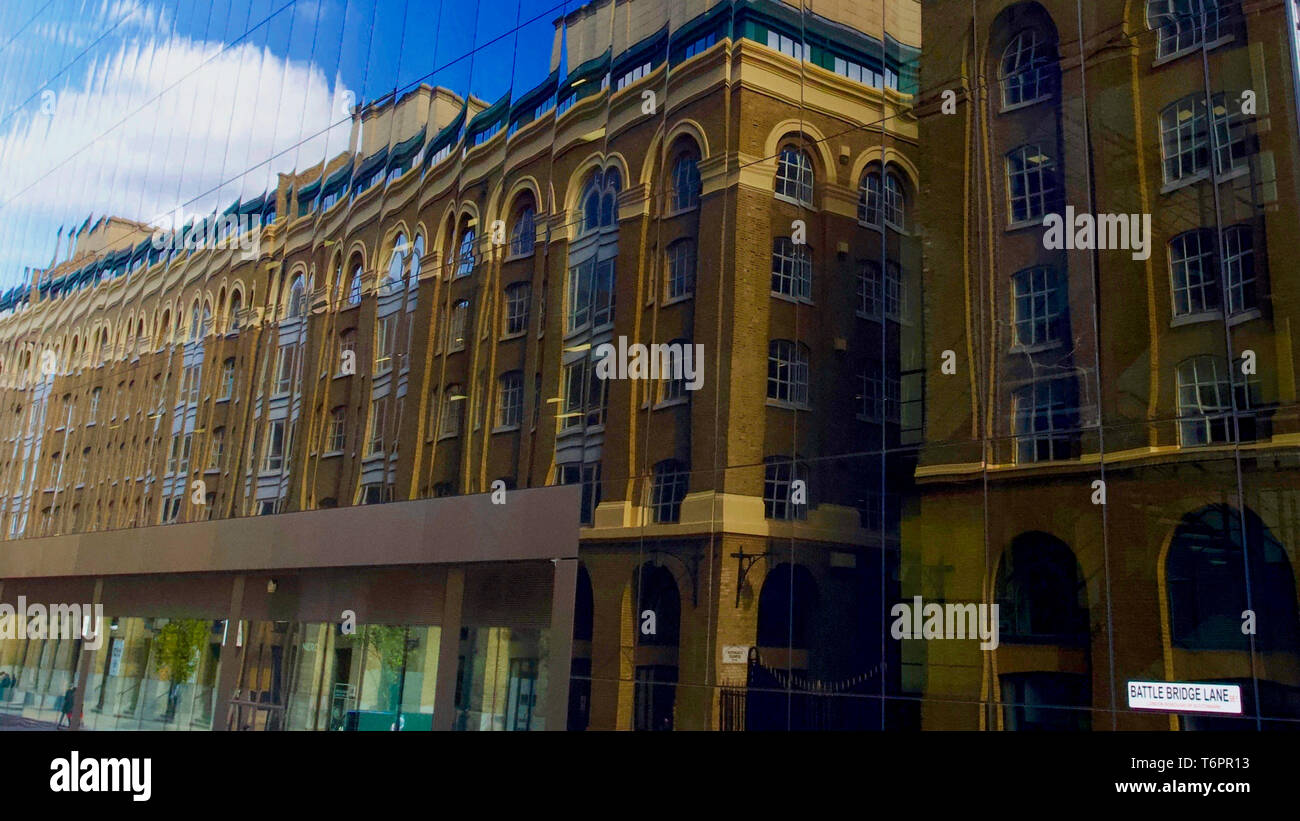 Reflection off glass window, London, England Stock Photo - Alamy