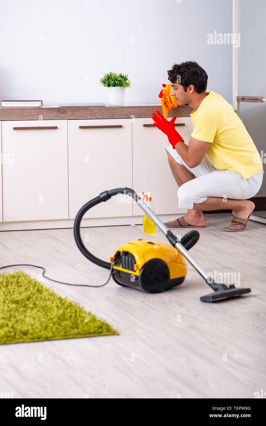 Man vacuum bed hi-res stock photography and images - Alamy