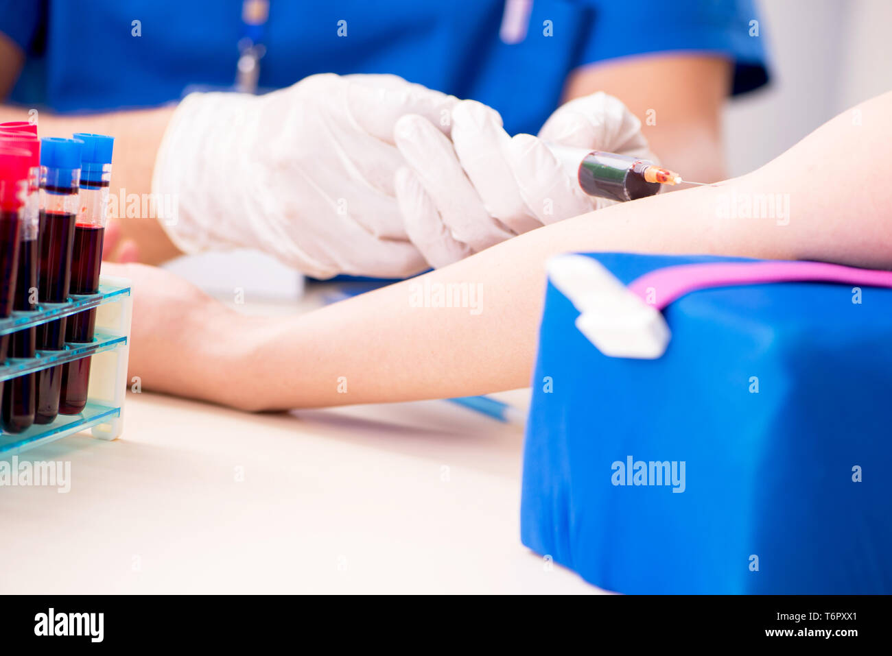 Young patient during blood test sampling procedure Stock Photo - Alamy