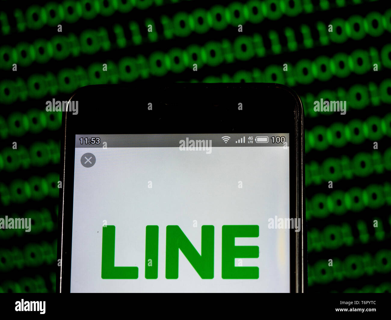 In this photo illustration a Line Corporation, Ltd. logo seen displayed ...