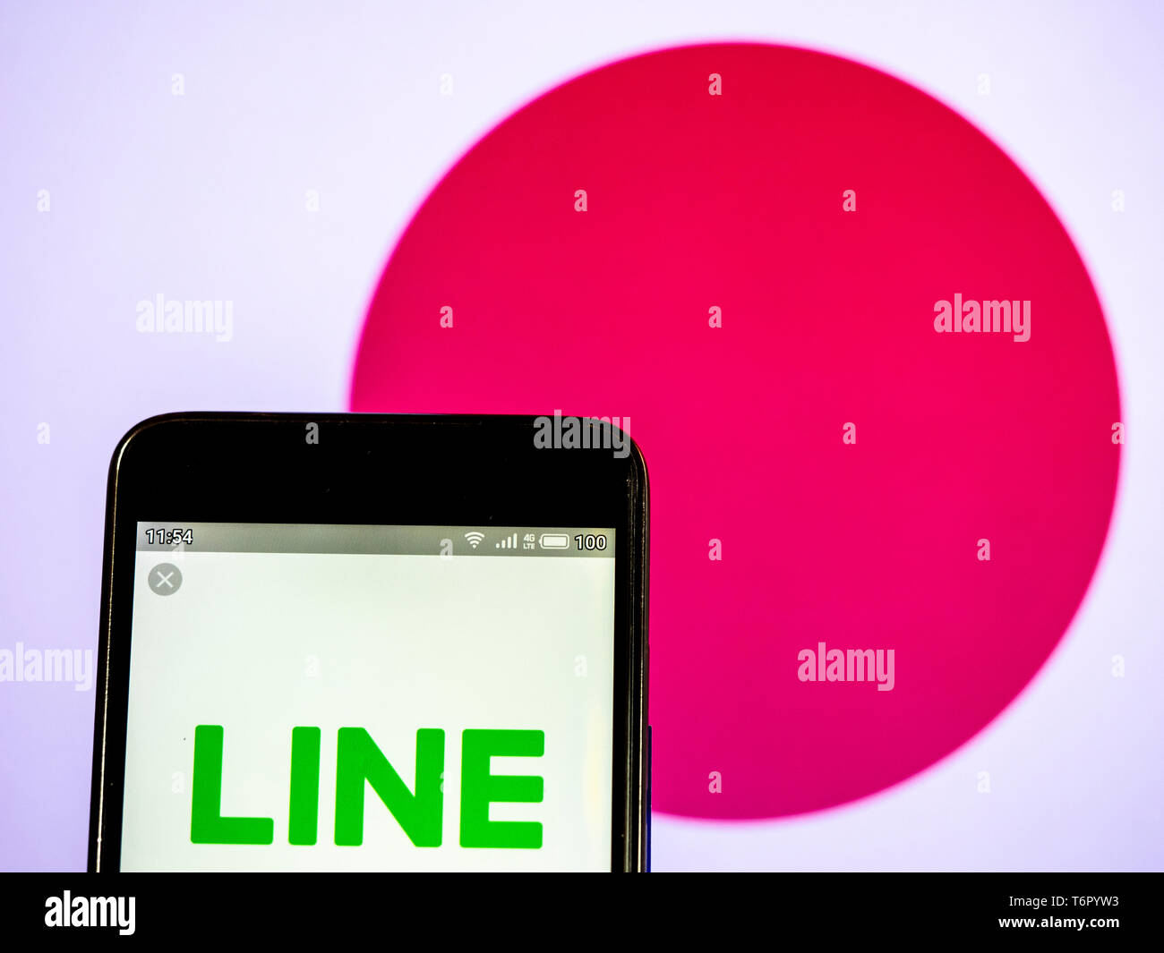 In this photo illustration a Line Corporation, Ltd. logo seen displayed ...