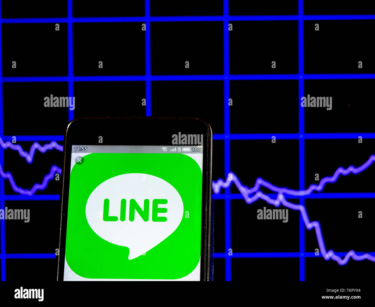 In this photo illustration a Line Corporation, Ltd. logo seen displayed ...