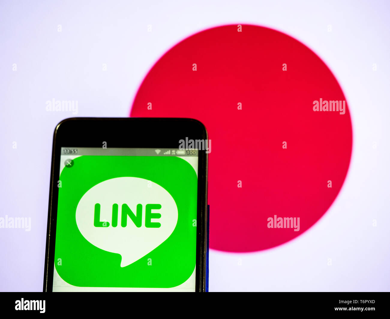 In this photo illustration a Line Corporation, Ltd. logo seen displayed ...