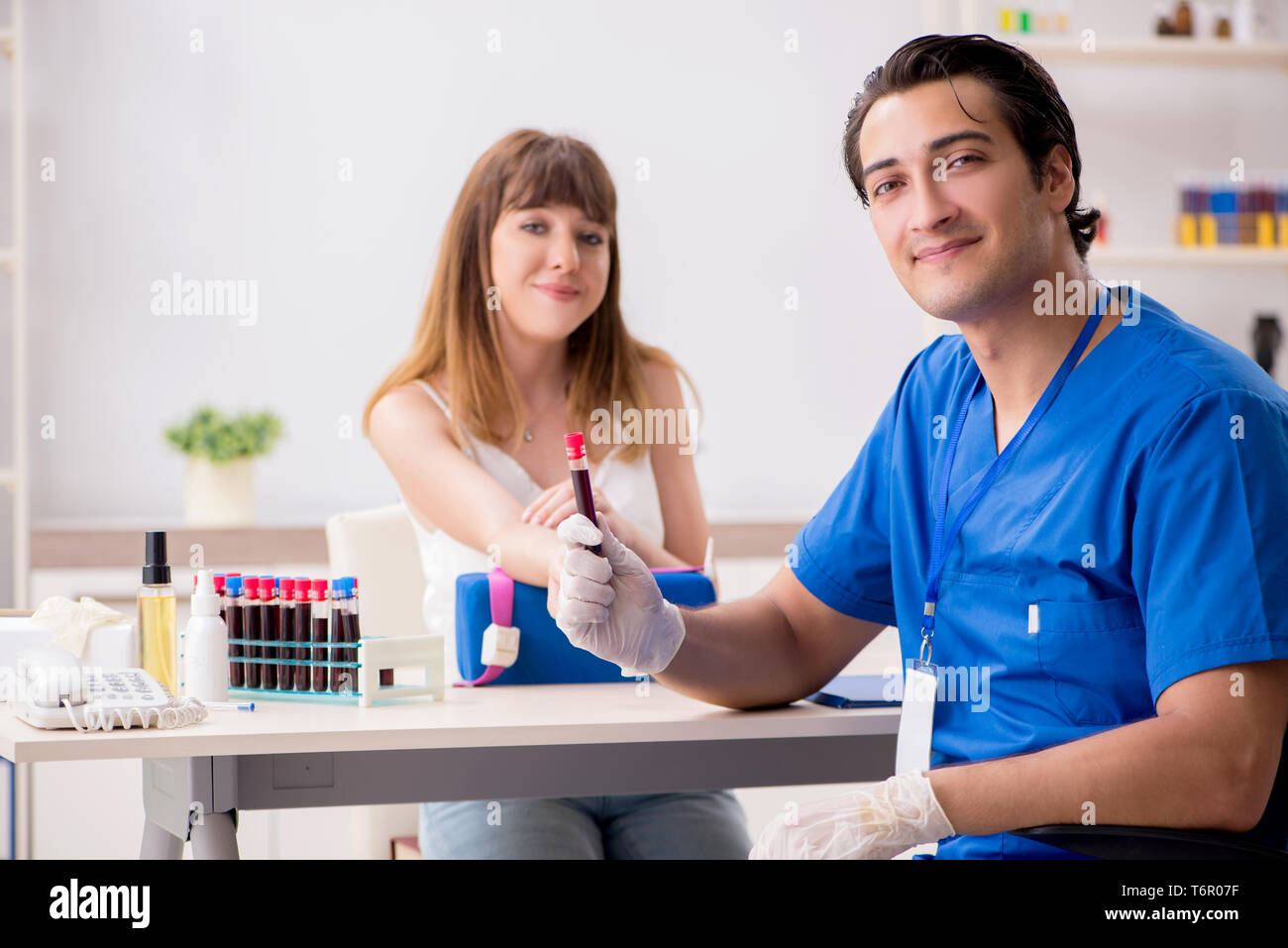 Young patient during blood test sampling procedure Stock Photo - Alamy