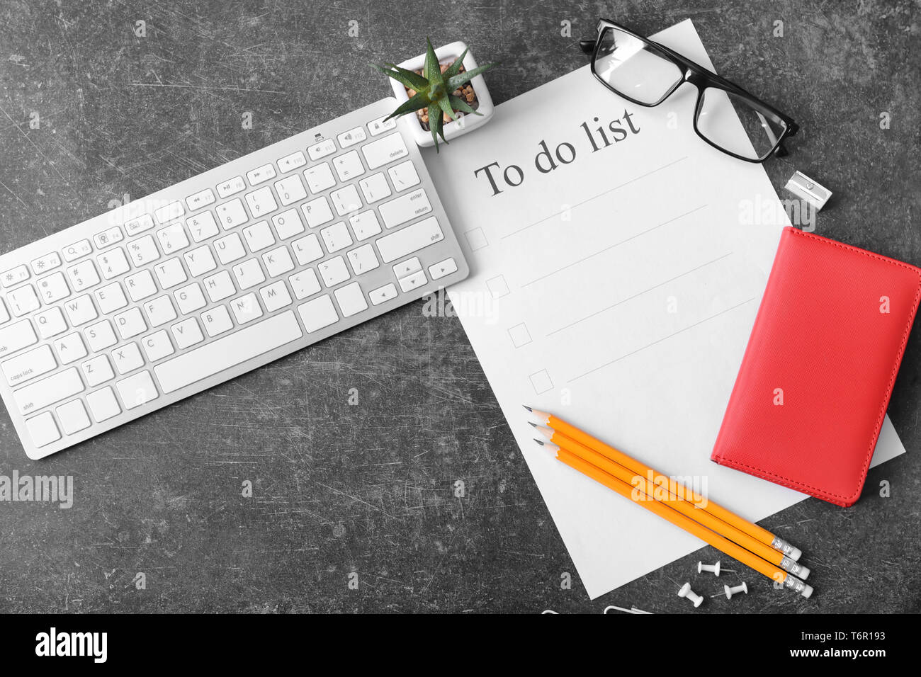 Empty to-do list with computer keyboard on grey background Stock Photo ...