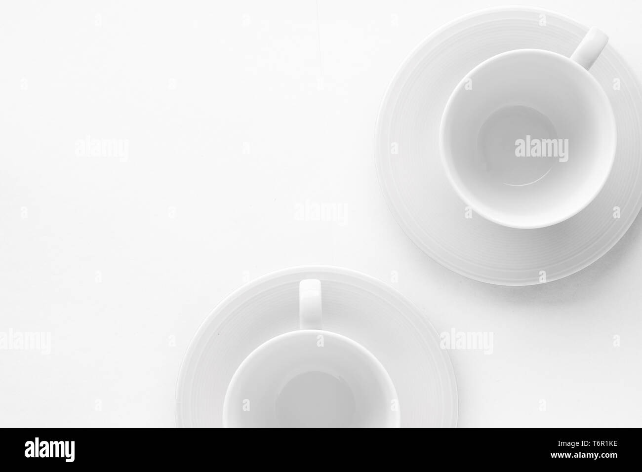 Kitchen, dishware design and drink concept - Empty cup and saucer ...