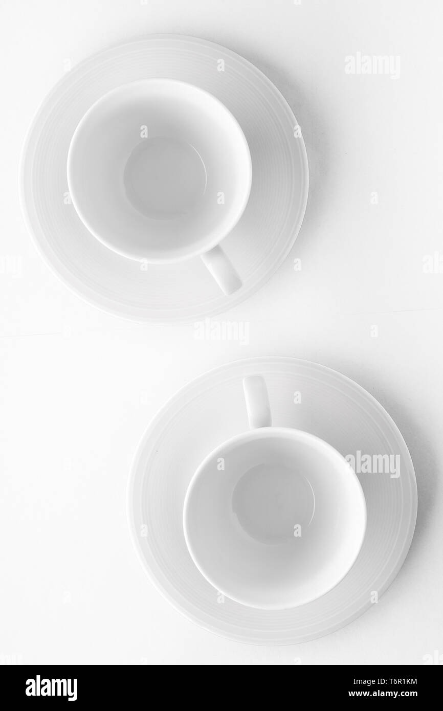Kitchen, dishware design and drink concept - Empty cup and saucer ...