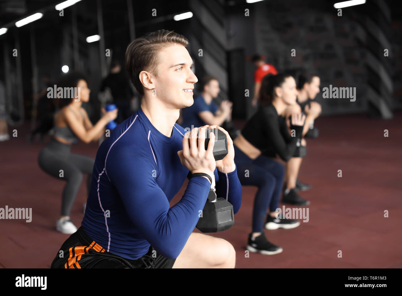 Group of athletes working out in gym Stock Photo - Alamy
