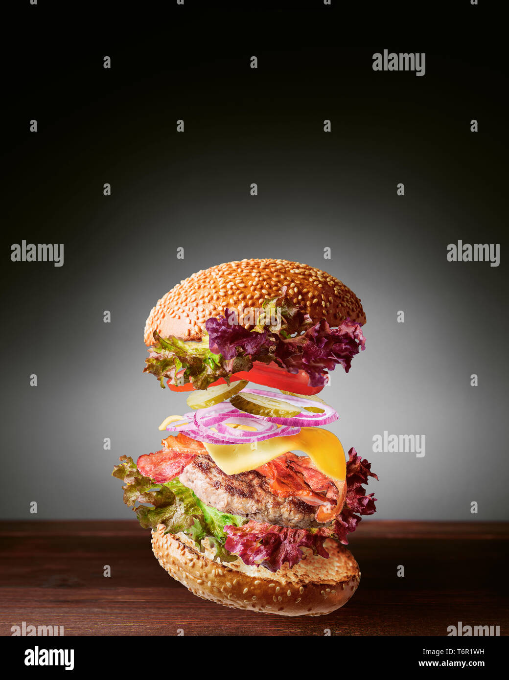 juicy and fresh classic burger with a large beef chop Stock Photo - Alamy
