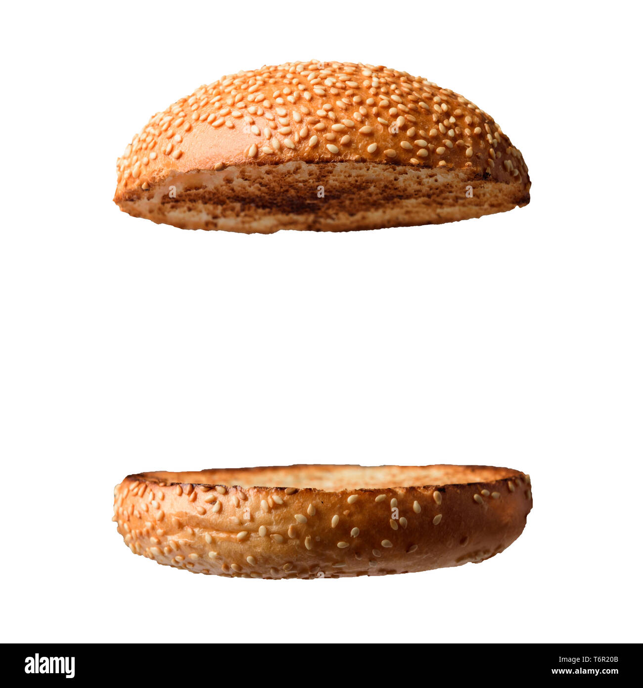 two halves of a burger burger grilled on a white background Stock Photo ...