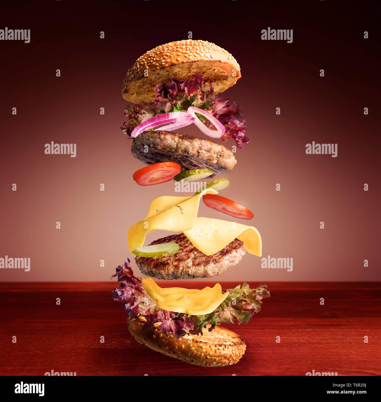 flying classic burger Stock Photo - Alamy