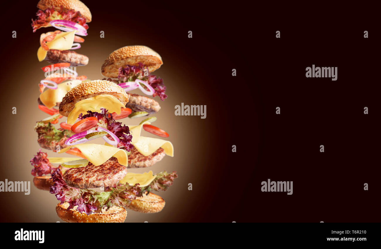 Set of three burgers of different sizes, ordinary, medium and huge ...