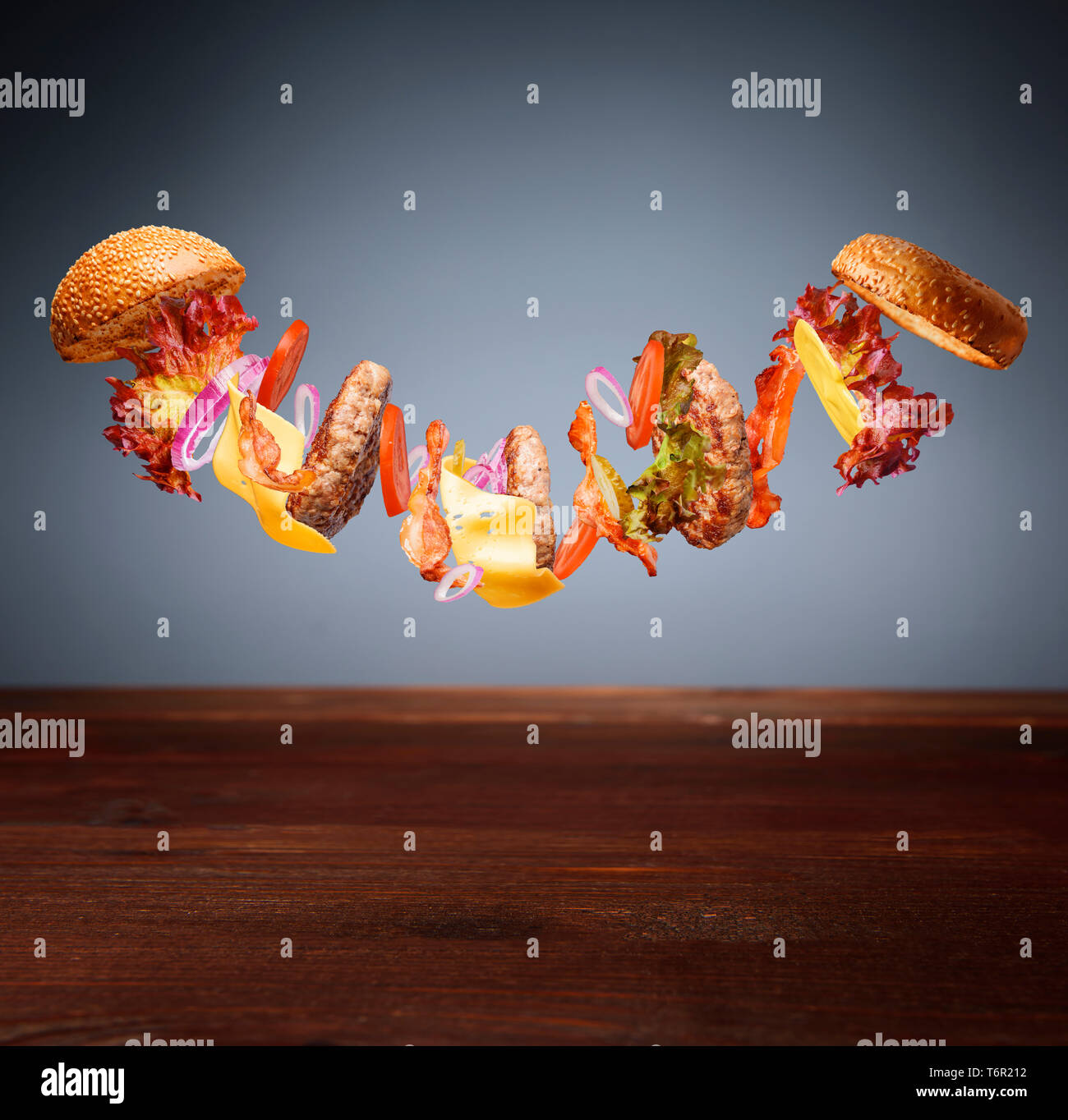 The exploding big burger with three succulent and tasty cutlets Stock ...