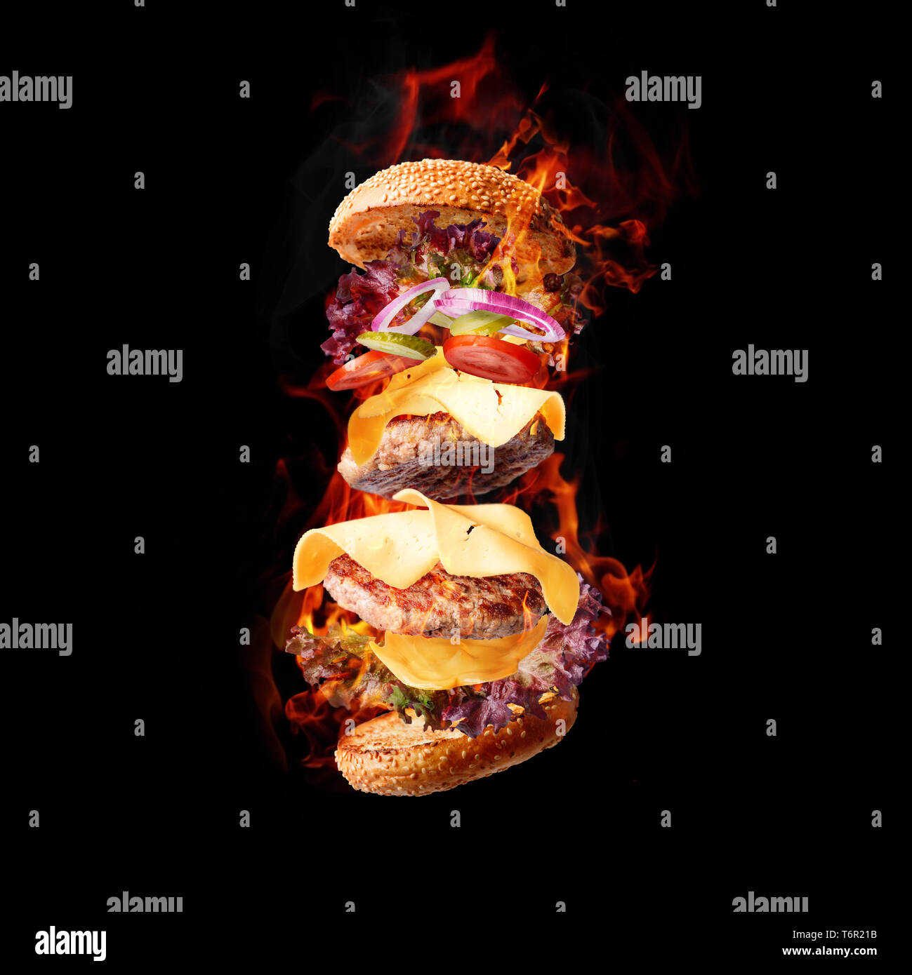burning and flying burger, a double cheeseburger with two succulent ...