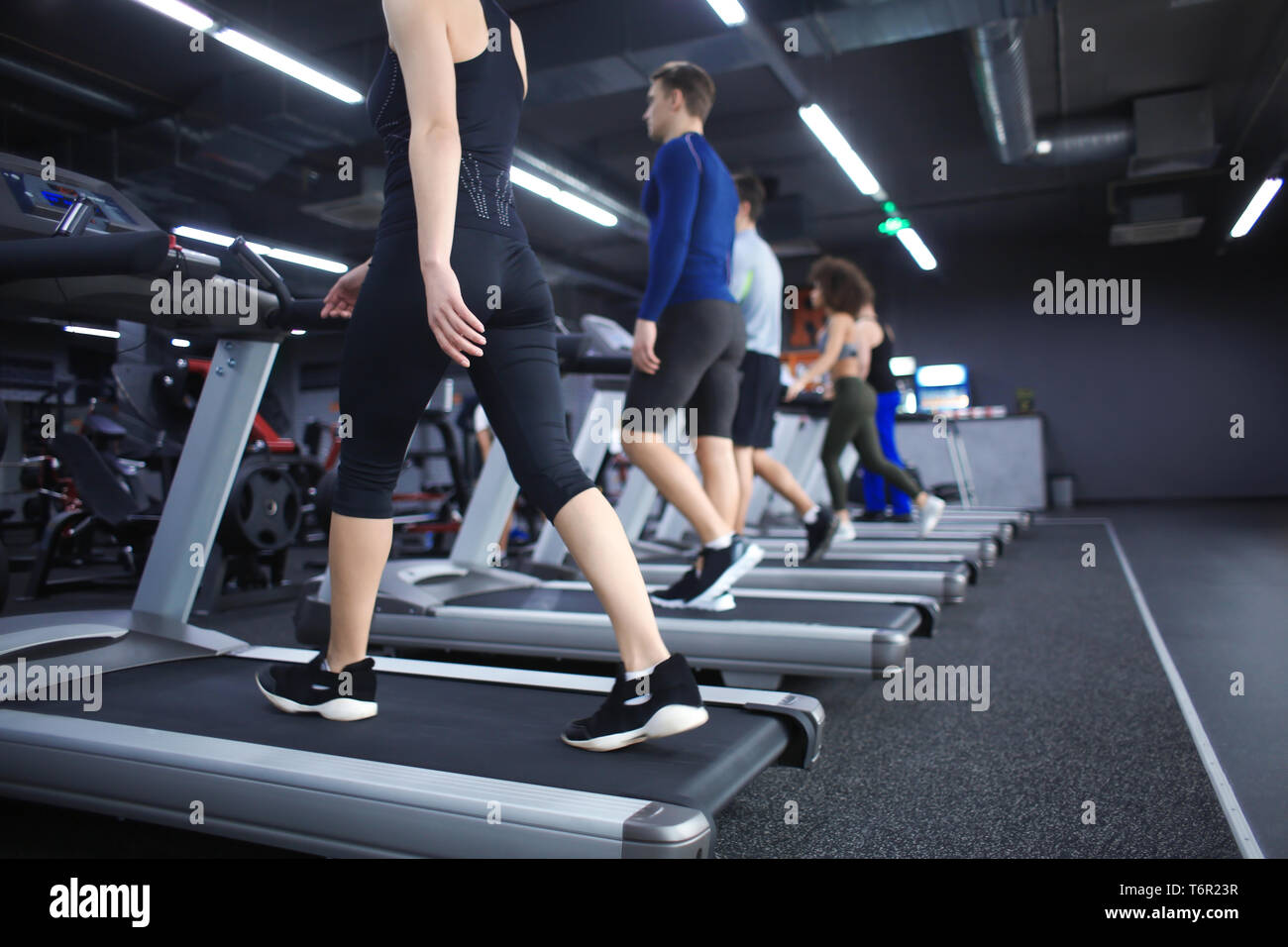 Group running machines hi-res stock photography and images - Alamy