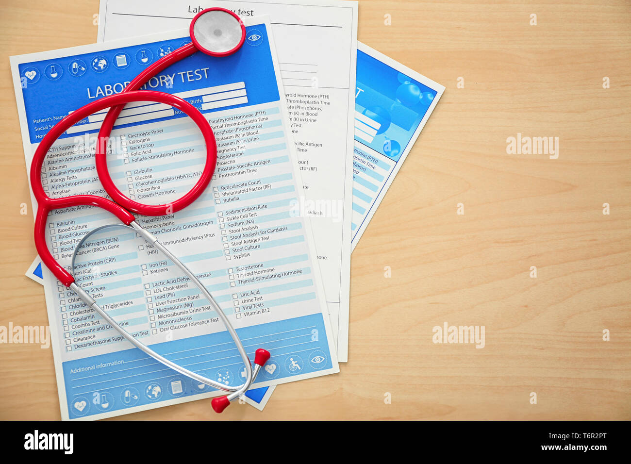 Test results with stethoscope on table Stock Photo - Alamy