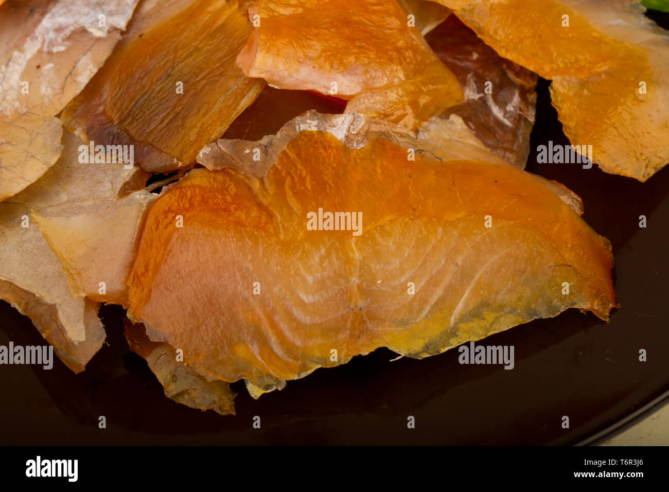 Smoked catfish fillet carpaccio Stock Photo - Alamy