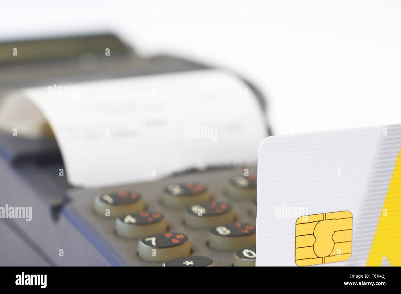 credit cards in swiper on white Stock Photo - Alamy