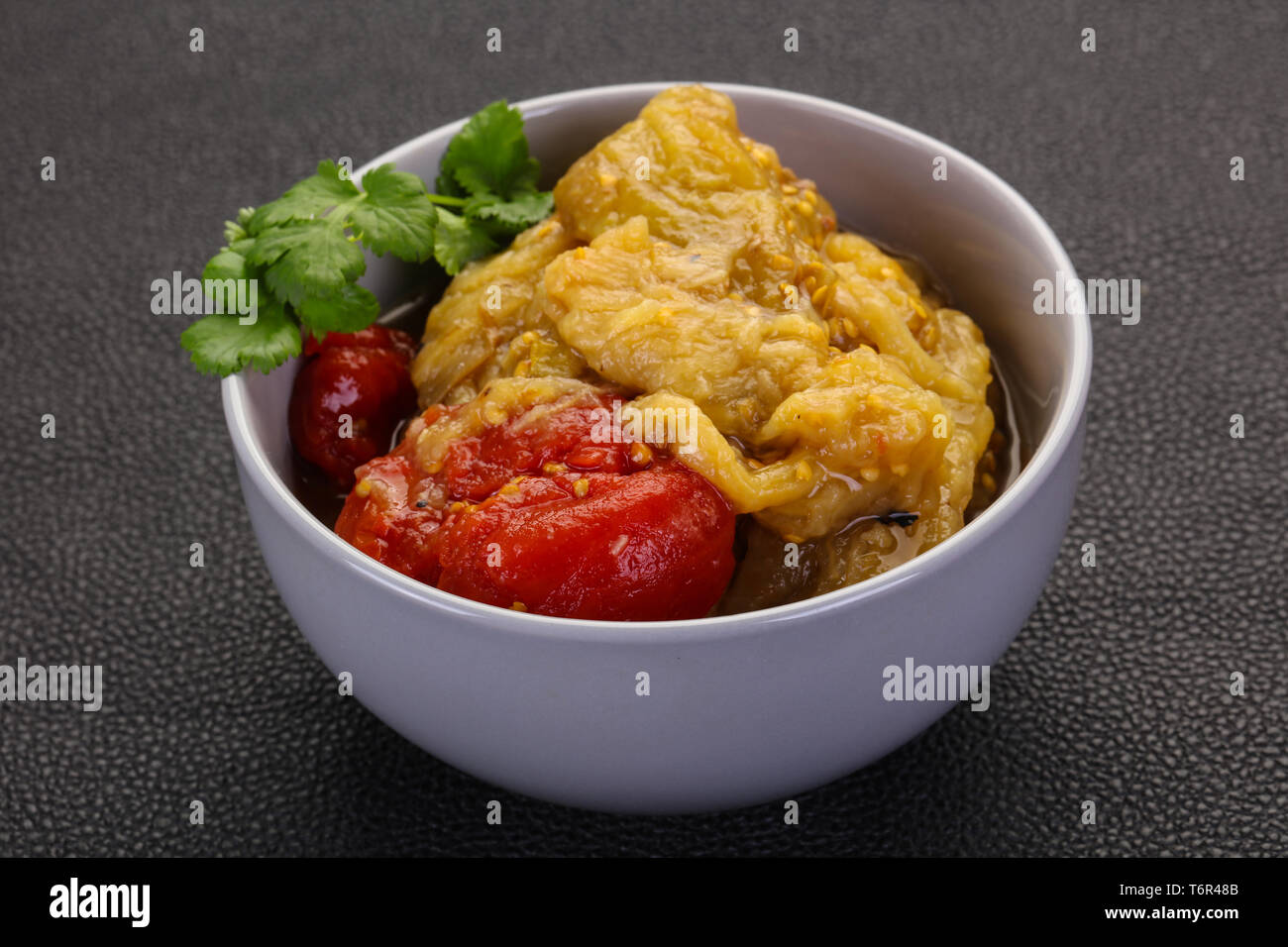 Caucasian cuisine - baked vegetables eggplant and tomato Stock Photo ...