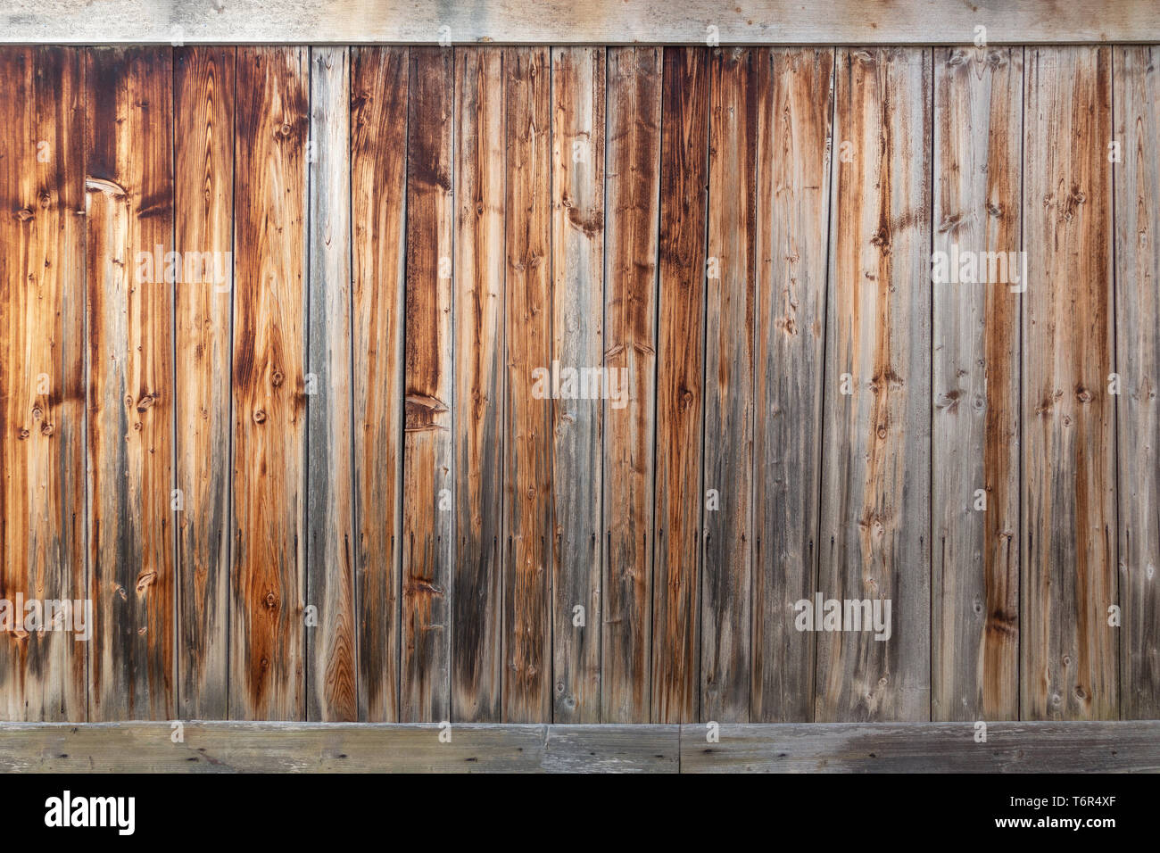 Heavily weathered board wall with crossbeams Stock Photo - Alamy