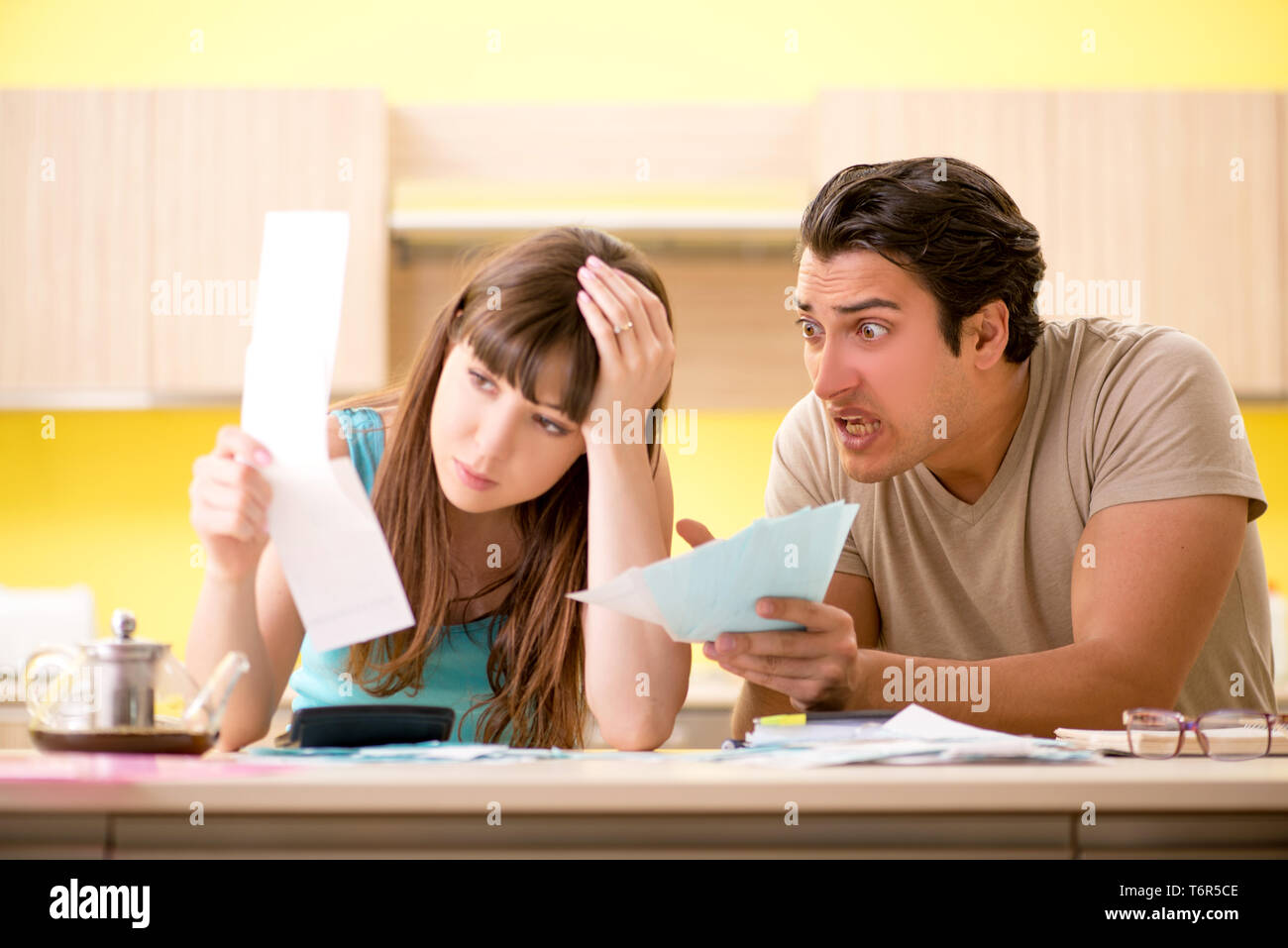 Young family struggling with personal finance Stock Photo - Alamy