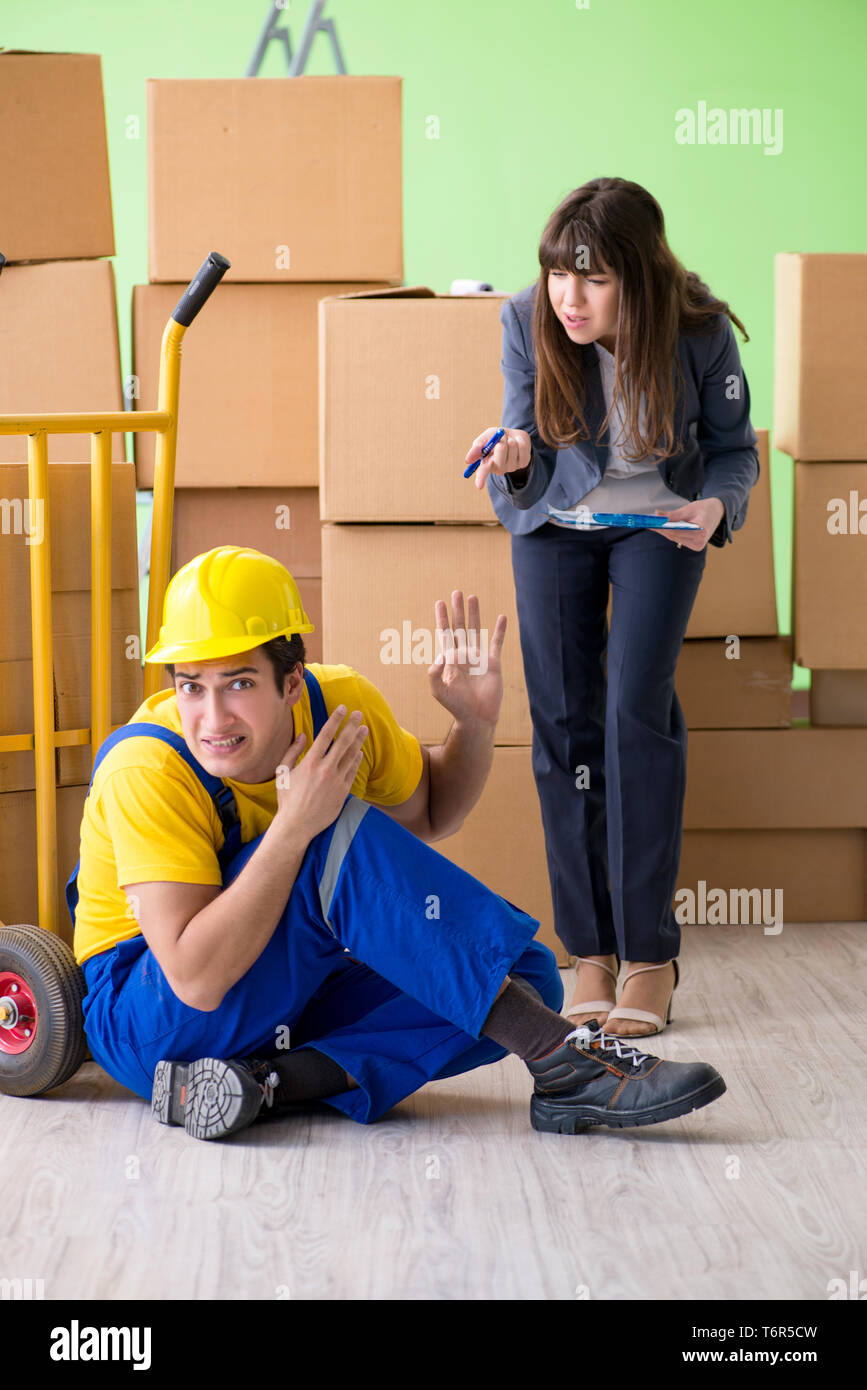 Woman boss and man contractor working with boxes delivery Stock Photo ...
