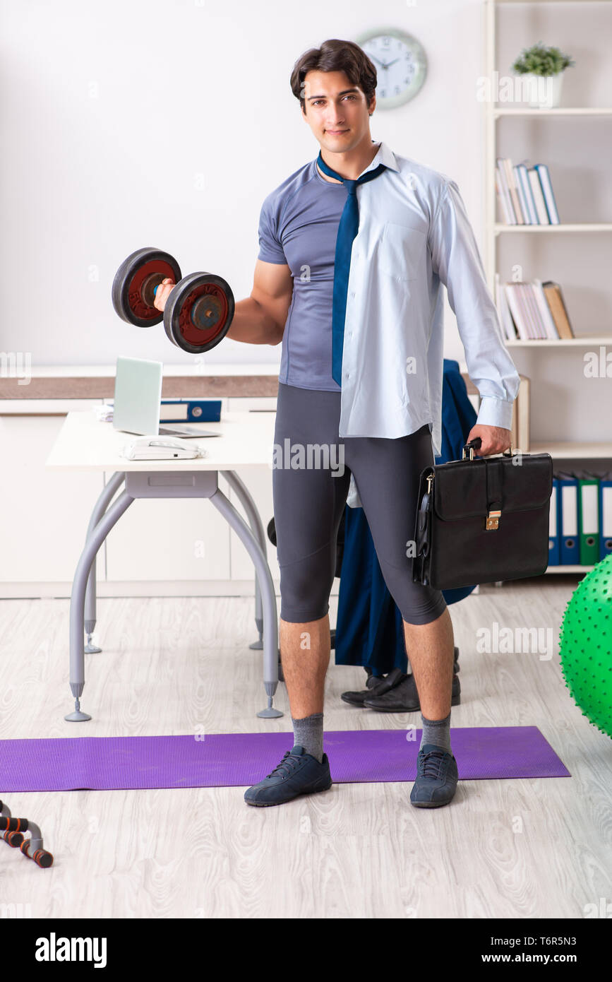 Employee combining work and healthy lifestyle Stock Photo - Alamy
