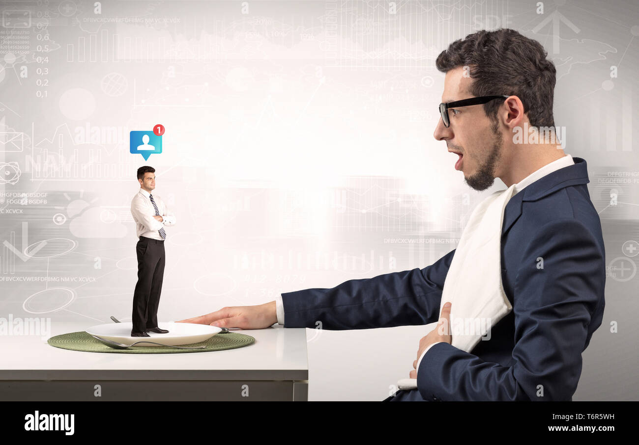 Giant businessman eating small man with financial background Stock ...