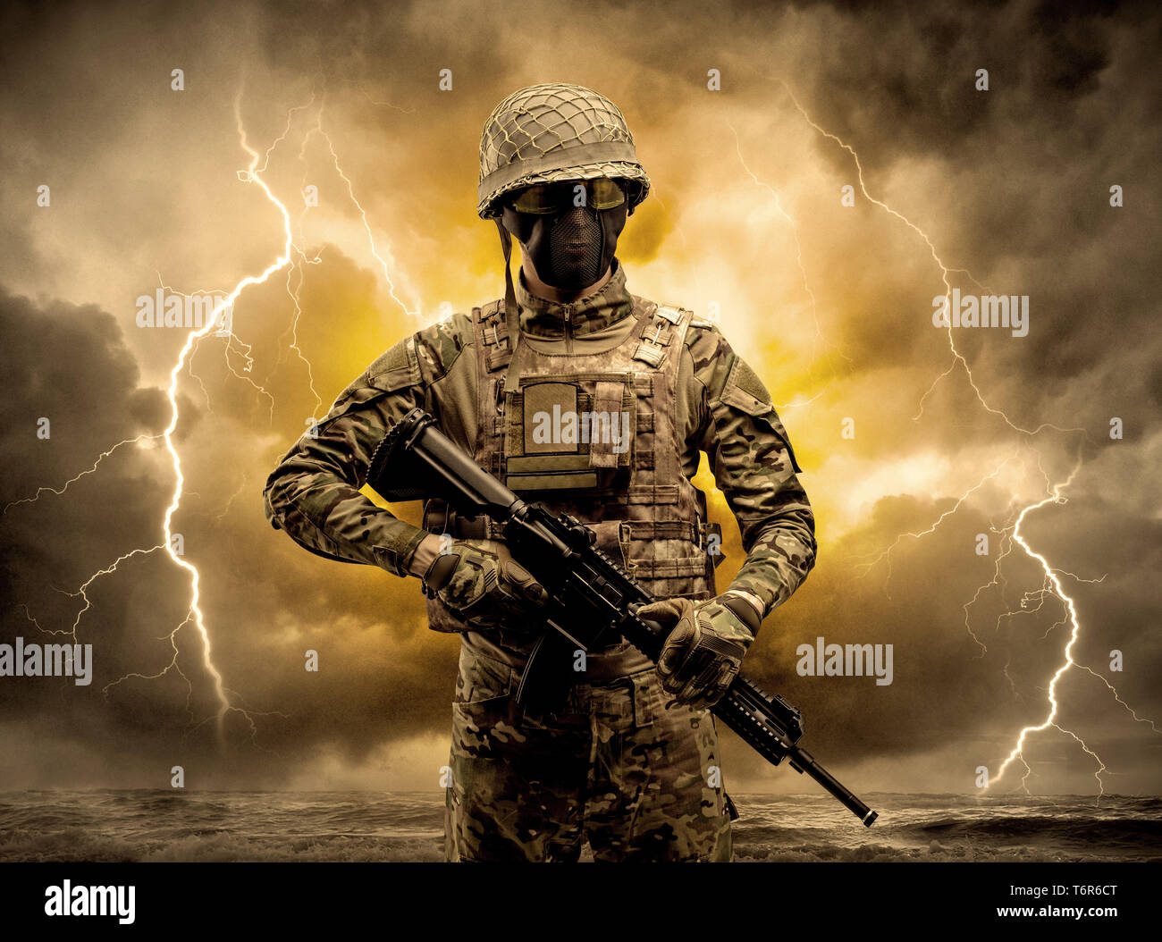 Armed soldier standing in rainy obscure weather Stock Photo - Alamy
