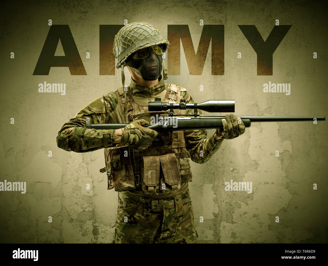 Uniformed armed soldier with damaged wall background Stock Photo - Alamy