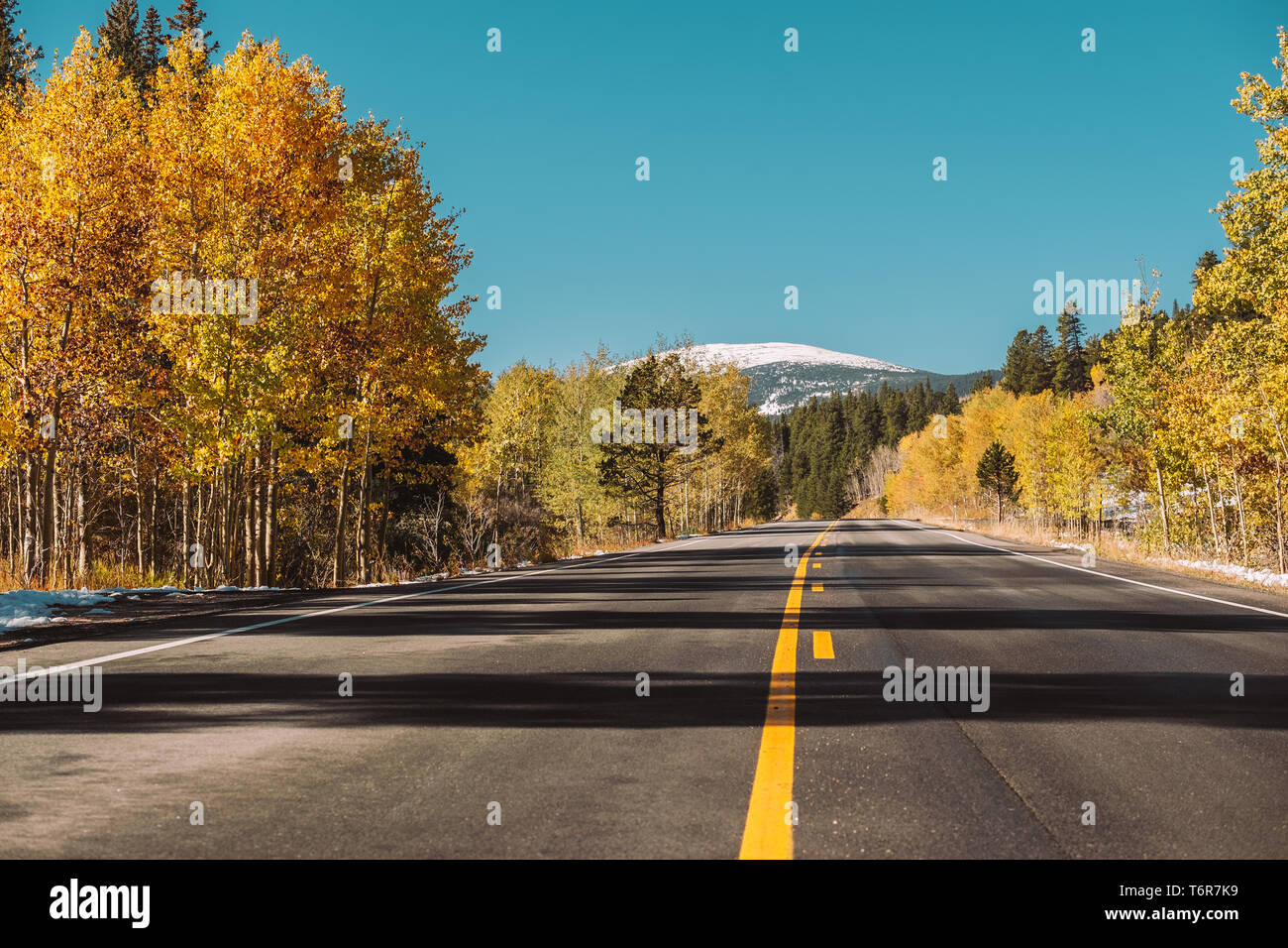 Highway at autumn in Colorado, USA Stock Photo - Alamy