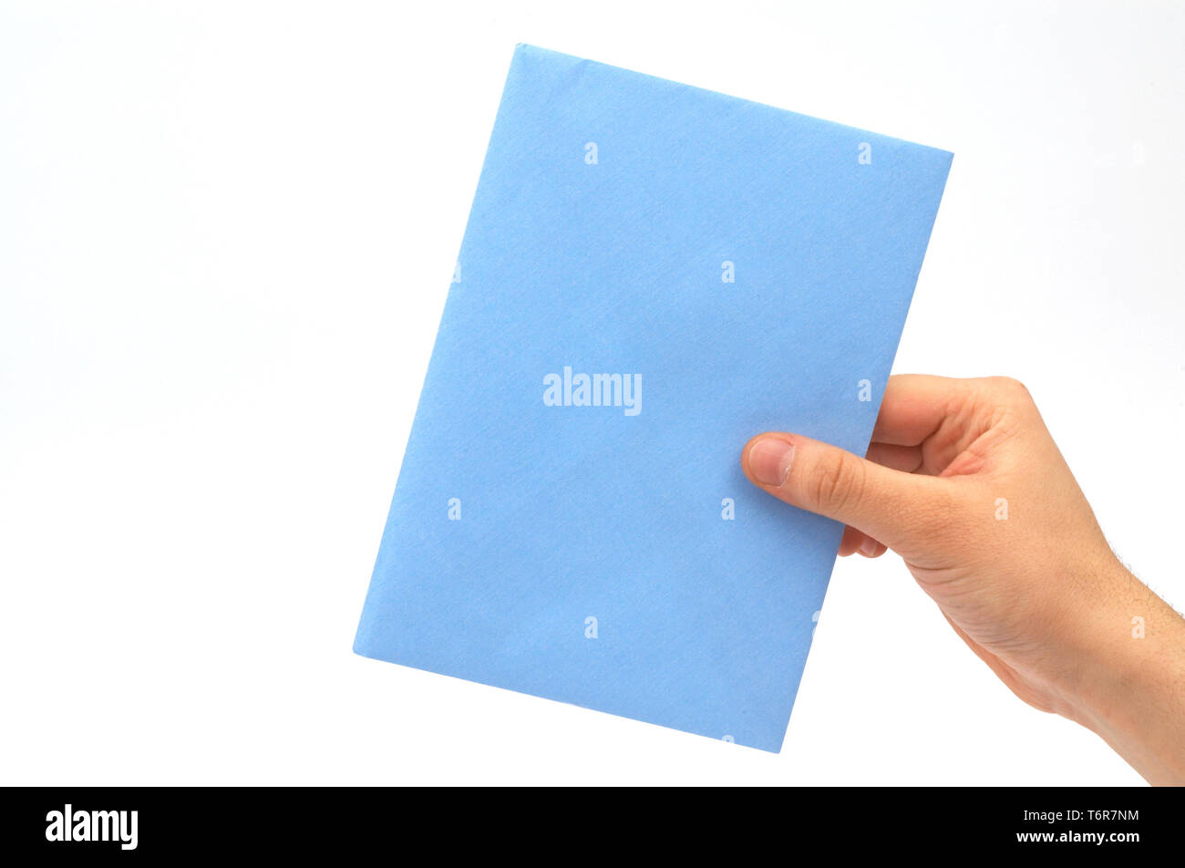 blue envelope in hand on white Stock Photo - Alamy