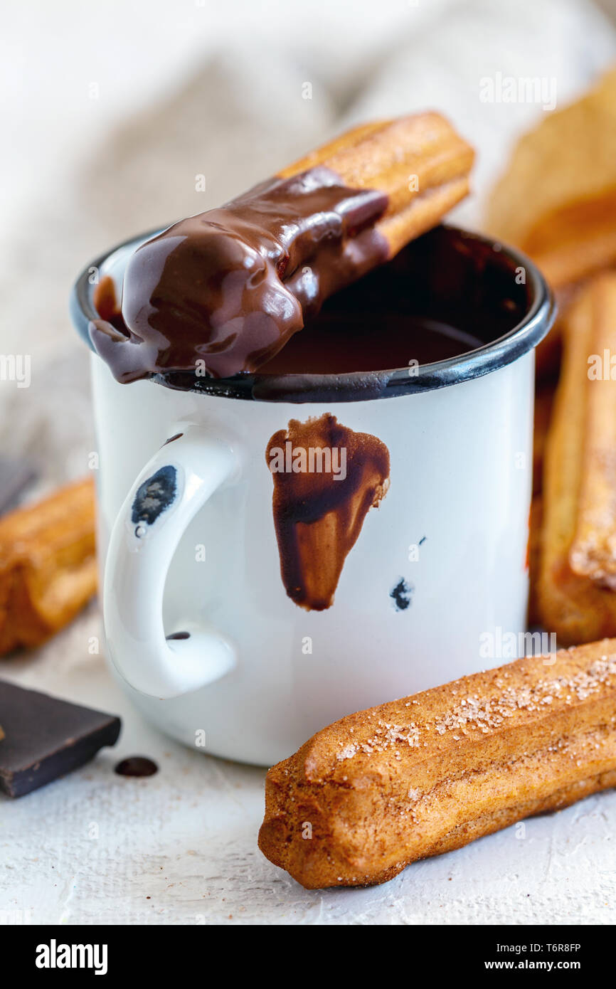 Traditional spanish churros dessert with hot chocolate Stock Photo - Alamy