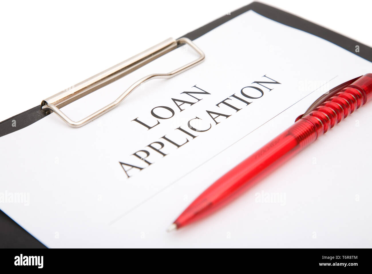 business loan application form with red pen on white background Stock ...